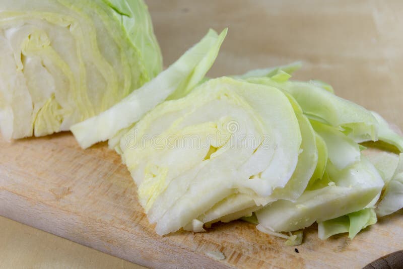 Fresh White Cabbage Cut into Strips on the Kitchen Table. Vegetables ...