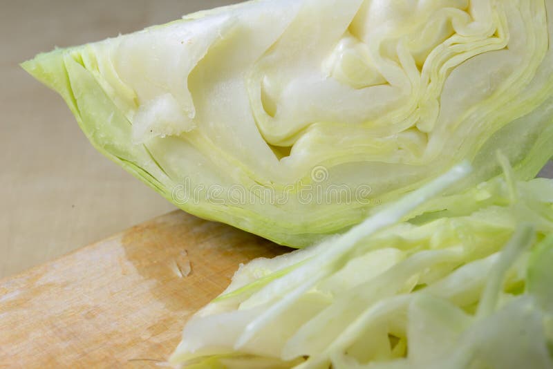 Fresh White Cabbage Cut into Strips on the Kitchen Table. Vegetables ...