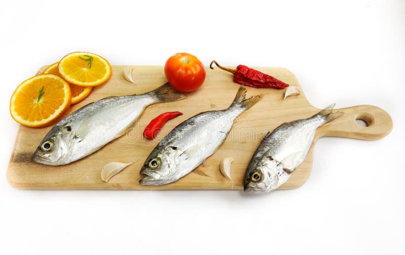 Fresh White Fish,False Trevally Decorated with Herbs and Vegetables .on ...