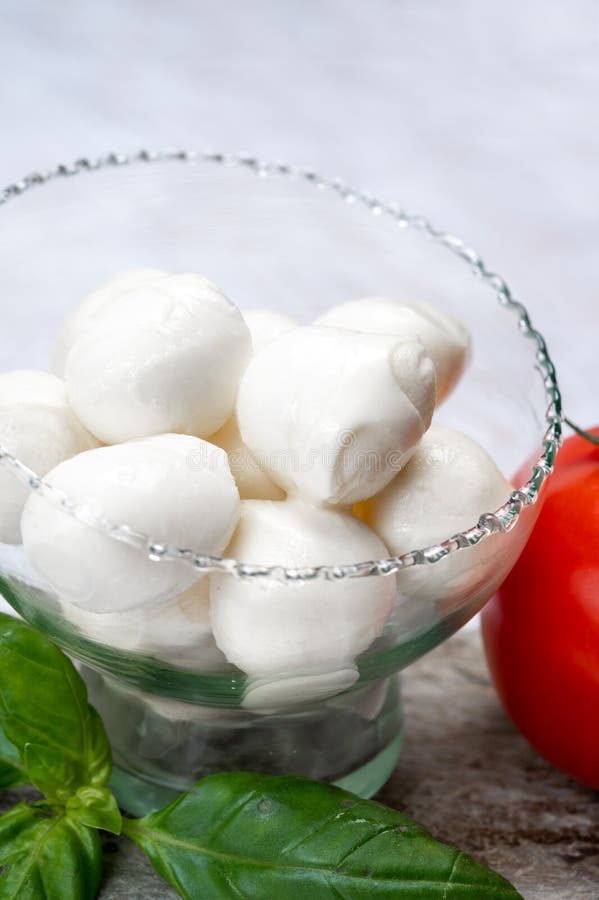 Fresh White Soft Mini Mozzarella Balls Served with Red Tomato and Fresh ...
