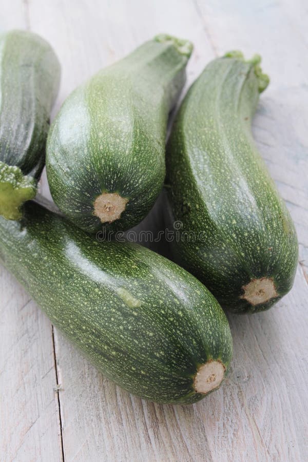 Fresh whole courgettes stock photo. Image of harvest - 61845130
