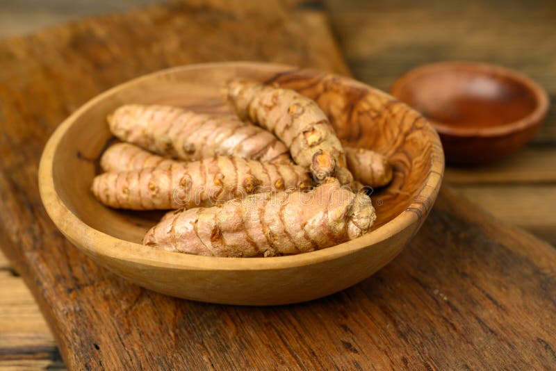 Whole dry turmeric roots stock photo. Image of herb - 192275012