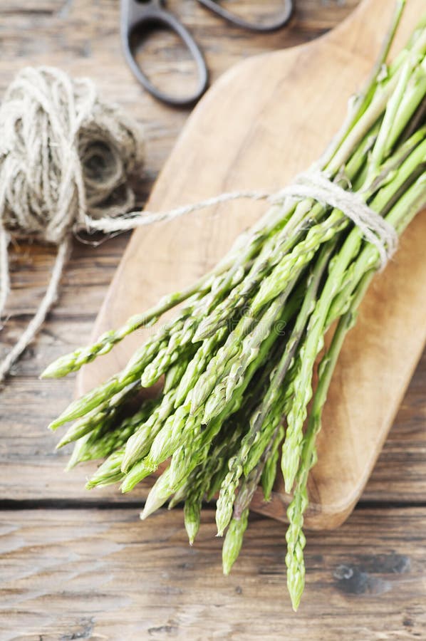 Fresh Wild Asparagus on the Wooden Table Stock Image - Image of organic ...