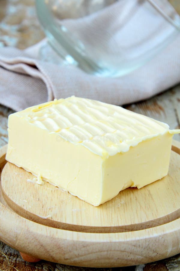 Fresh Yellow Butter on a Wooden Stand Stock Photo - Image of margarine ...