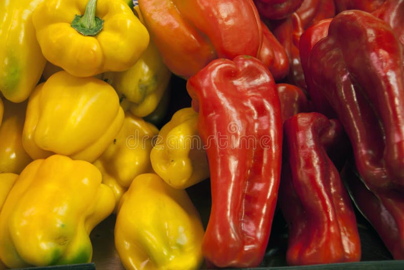 Fresh Yellow and Red Pepperoni Sold at the Market. Stock Image - Image ...