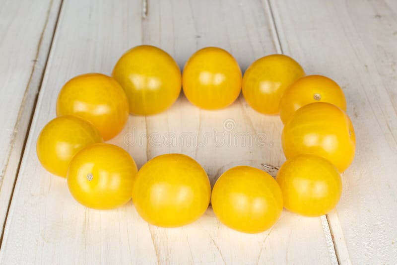 Fresh Yellow Tomato on Grey Wood Stock Image - Image of heap ...