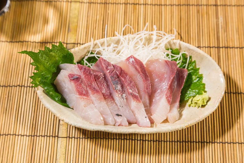Fresh Yellowtail Sashimi - Hamachi Sashimi on Bamboo Mat Stock Image ...