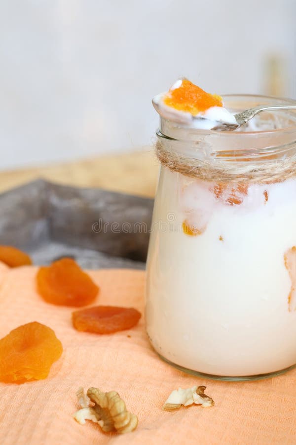 Fresh Yogurt with Pieces of Apricot and Nuts Stock Image - Image of ...
