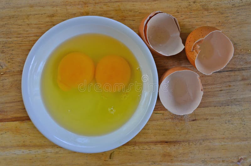 Fresh Yolk and Albumen with Opened Shells Stock Photo - Image of food ...