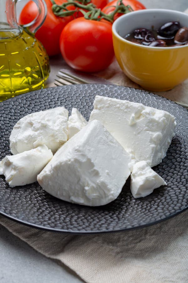 Fresh Young Soft White Feta Cheese on Black Plate Stock Photo - Image ...
