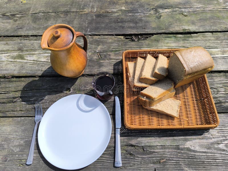 The Freshest, Warm Bread Lying Next To a White Plate on an Antique ...