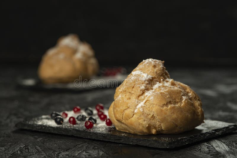 Freshly Baked Big Eclair Black Cutting Board Stock Photos - Free ...