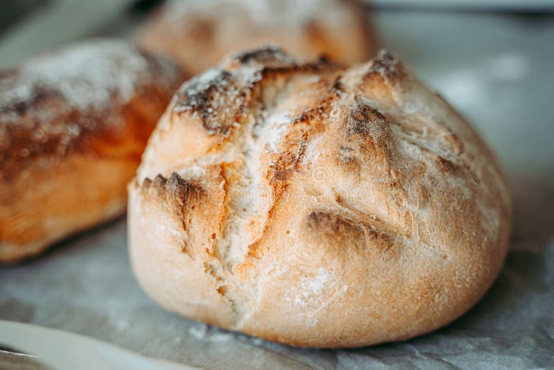 Crusty Freshly Baked Bread in the Bakery Stock Photo - Image of ...