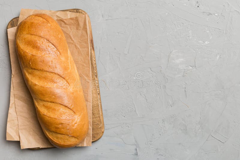 Freshly Baked Bread with Napkin on Rustic Table Top View. Healthy White ...