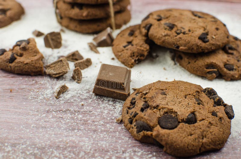 Freshly Baked Chocolate Chip Cookies on Rustic Wooden Table Stock Photo ...