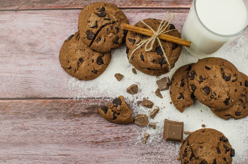 Freshly Baked Chocolate Chip Cookies on Rustic Wooden Table Stock Photo ...