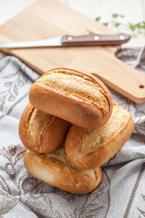 Freshly baked crusty rolls stock photo. Image of baking - 74300406