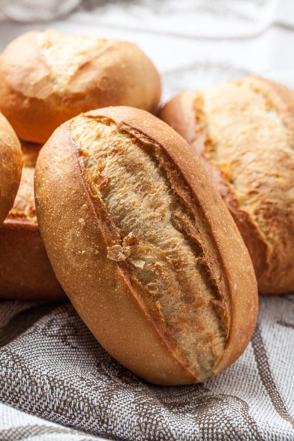Freshly baked crusty rolls stock photo. Image of starch - 74301112