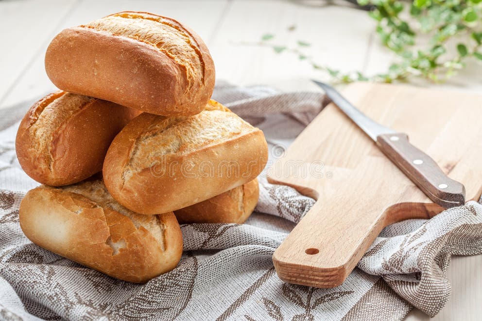Freshly baked crusty rolls stock image. Image of breakfast - 79160751