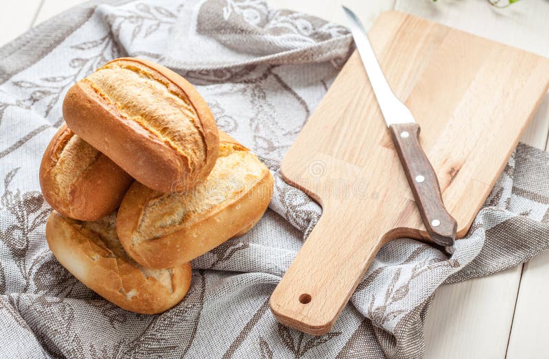 Freshly baked crusty rolls stock photo. Image of crisp - 93403466