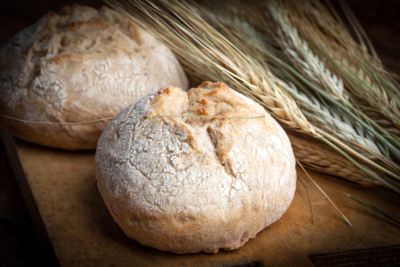 Freshly Baked Crusty Rolls. Stock Image - Image of fresh, planks: 61075833