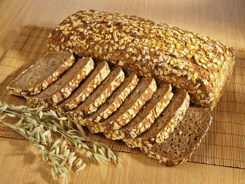 Freshly Baked Full Grain Bread on Table Stock Image - Image of eating ...