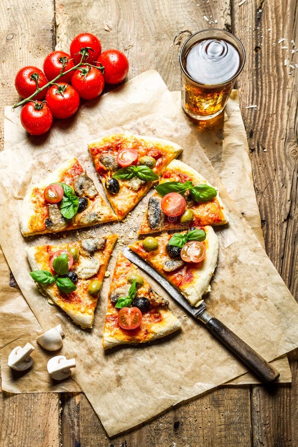 Freshly Baked Pizza Served with a Cold Drink Stock Photo - Image of ...