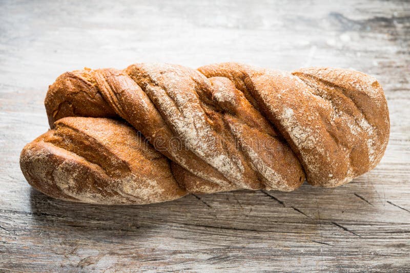 Freshly Baked Rustic Bread on the Rustic Background Stock Image - Image ...