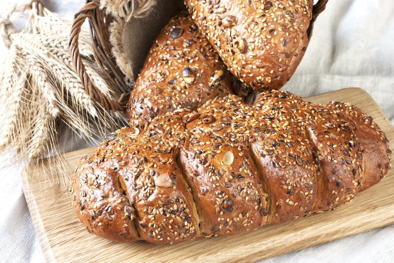 Freshly Baked Traditional Bread on Wooden Board Stock Photo - Image of ...