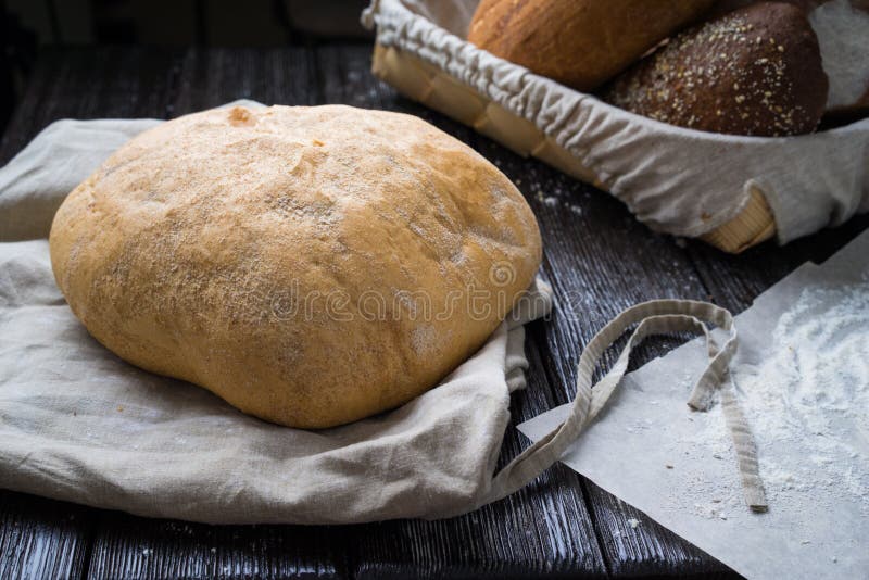 Freshly Baked Traditional Bread on Wooden Table Stock Photo - Image of ...