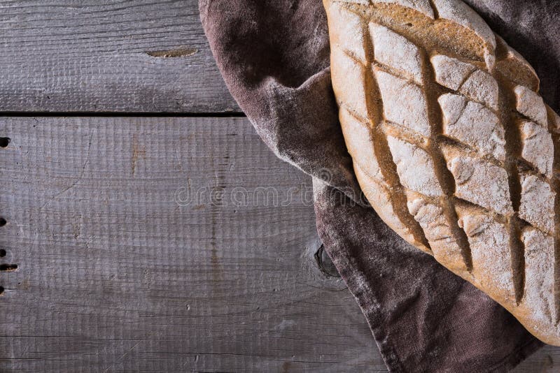 Freshly Baked Traditional Bread on Wooden Table Stock Image - Image of ...