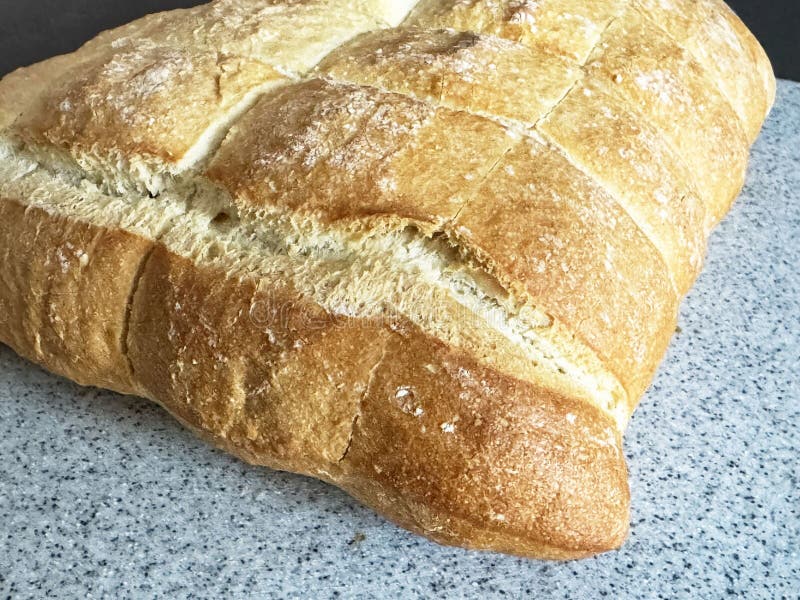 Freshly Baked Traditional Square Bread Loaf on Granite Surface Stock ...