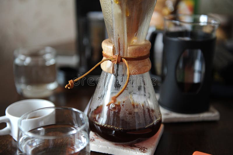 Freshly Brewed Coffee in a Glass Jug on the Background of Coffee ...