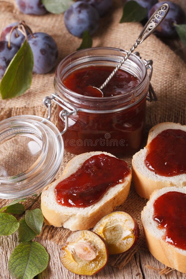 Freshly Brewed Homemade Plum Jam and Toast Close-up. Vertical Stock ...