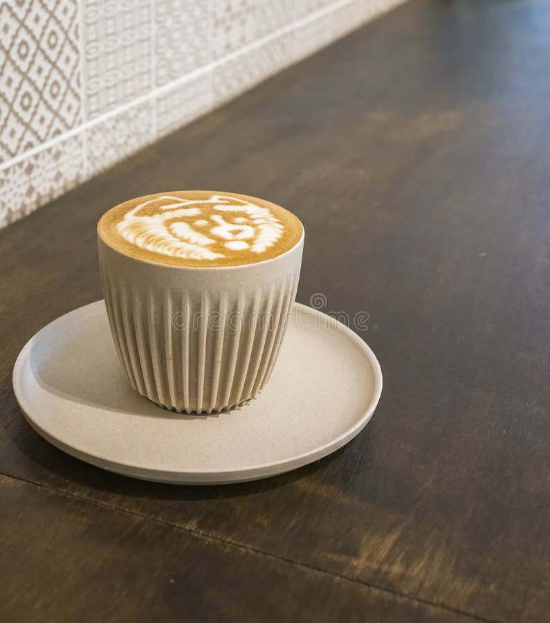 Freshly Brewed Latte in a Beige Porcelain Coffee Cup Stock Image ...