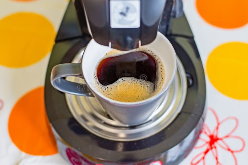 Freshly Cooked Coffee from the Coffee Machine Stock Photo - Image of ...