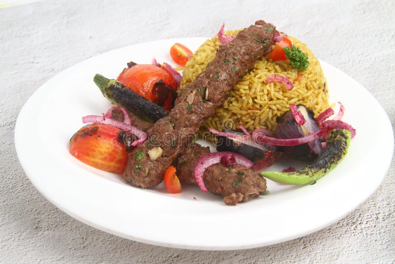 Freshly Cooked Kebab with Vegetables and Biryani Rice Stock Photo ...