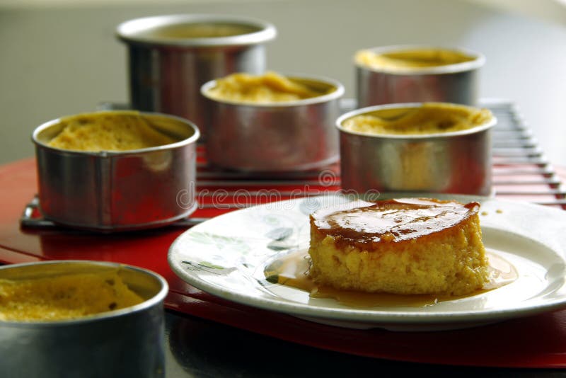 Freshly Cooked Leche Flan on a Table Stock Photo - Image of kitchen ...