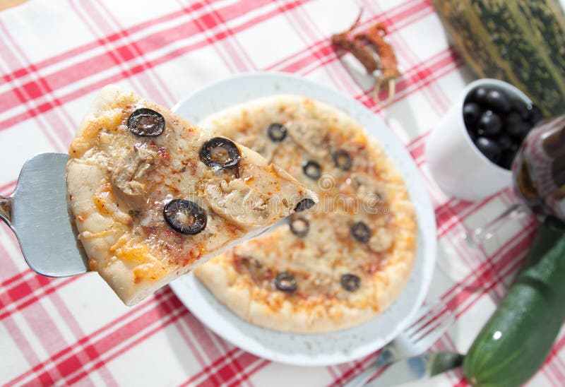 Freshly cooked Pizza stock photo. Image of black, cooking - 21959686