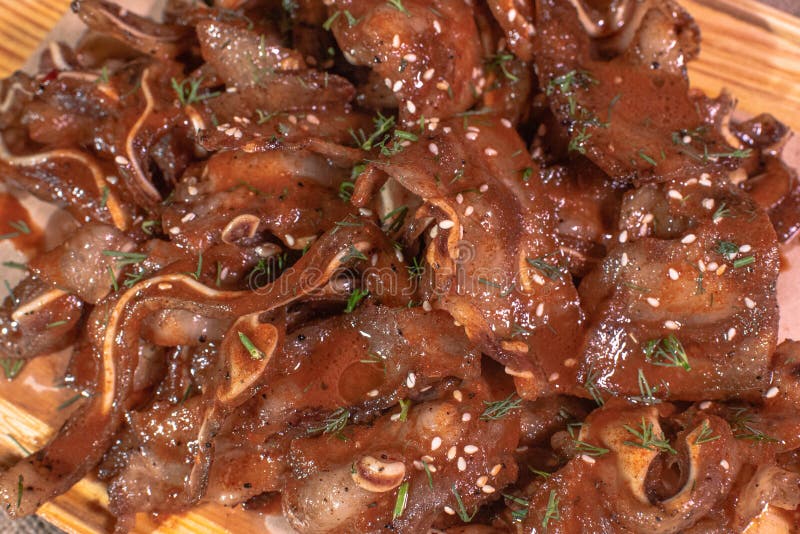 Freshly Cooked Pork Ears in Tabasco Sauce. Stock Photo - Image of long ...