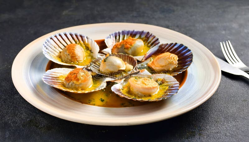 Freshly Cooked Scallops in Their Shells with Vibrant Green Herbs and ...