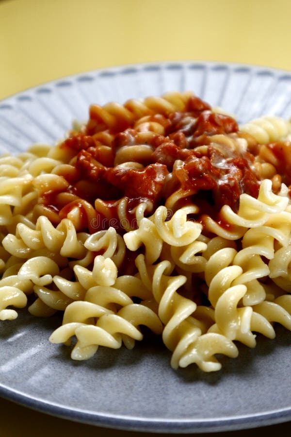 Freshly Cooked Spiral Pasta With Cheese And Tomato Sauce Stock Image