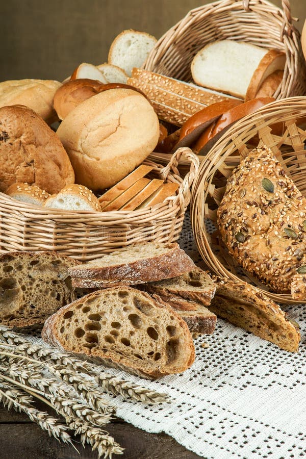 Freshly Crusty Bread on a Wooden Kitchen Table Stock Image - Image of ...