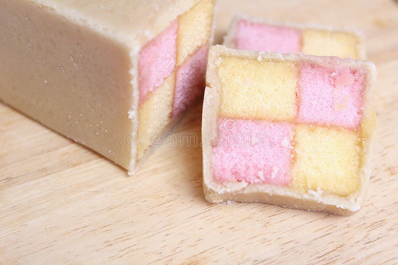 Freshly Cut Battenberg Cake Slices with Pink and Yellow Sponge Covered ...