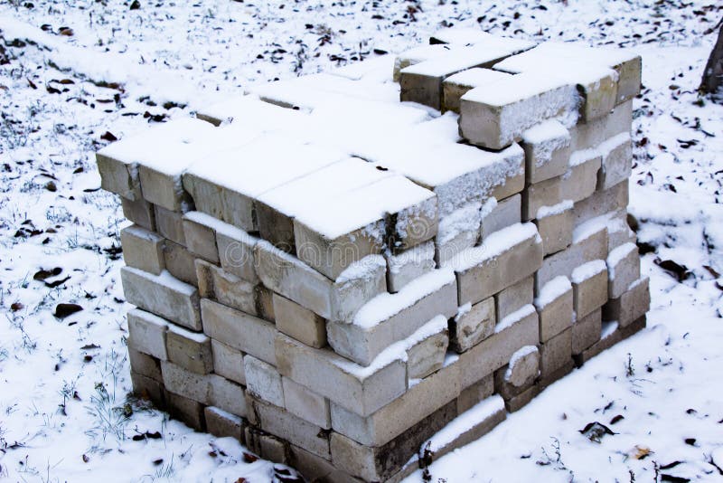 Freshly Fallen Snow on a Building Material a Pile of Bricks Stock Photo ...