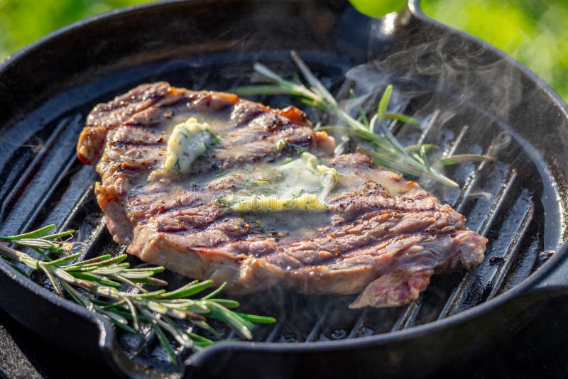 Freshly grilled steak stock photo. Image of green, cook - 334911276