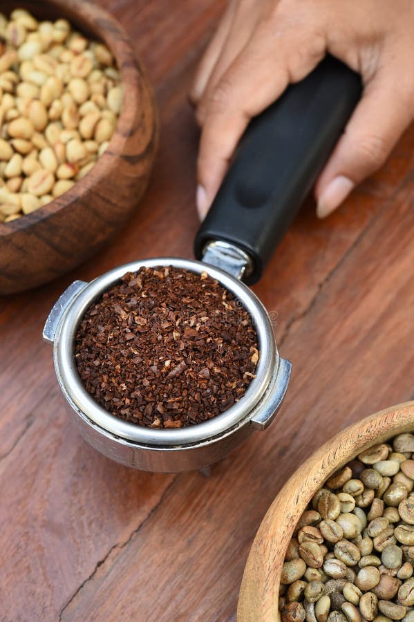 Freshly Ground Coffee Beans in a Metal Filter and Different Coffee ...