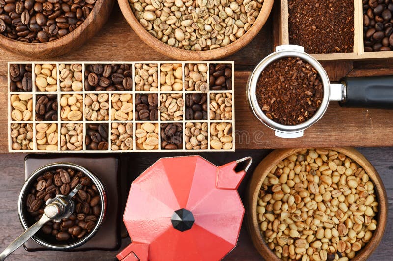 Freshly Ground Coffee Beans in a Metal Filter and Coffee Beans with Red ...