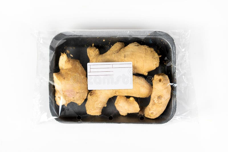 Freshly Harvested Ginger in a Labeled Pack on White Background Stock ...