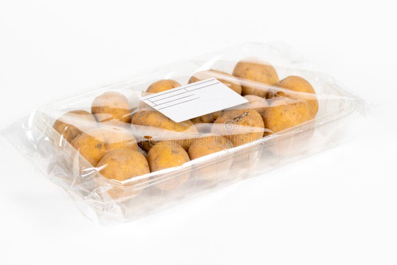 Freshly Harvested Potatoes in a Labeled Pack on White Background Stock ...